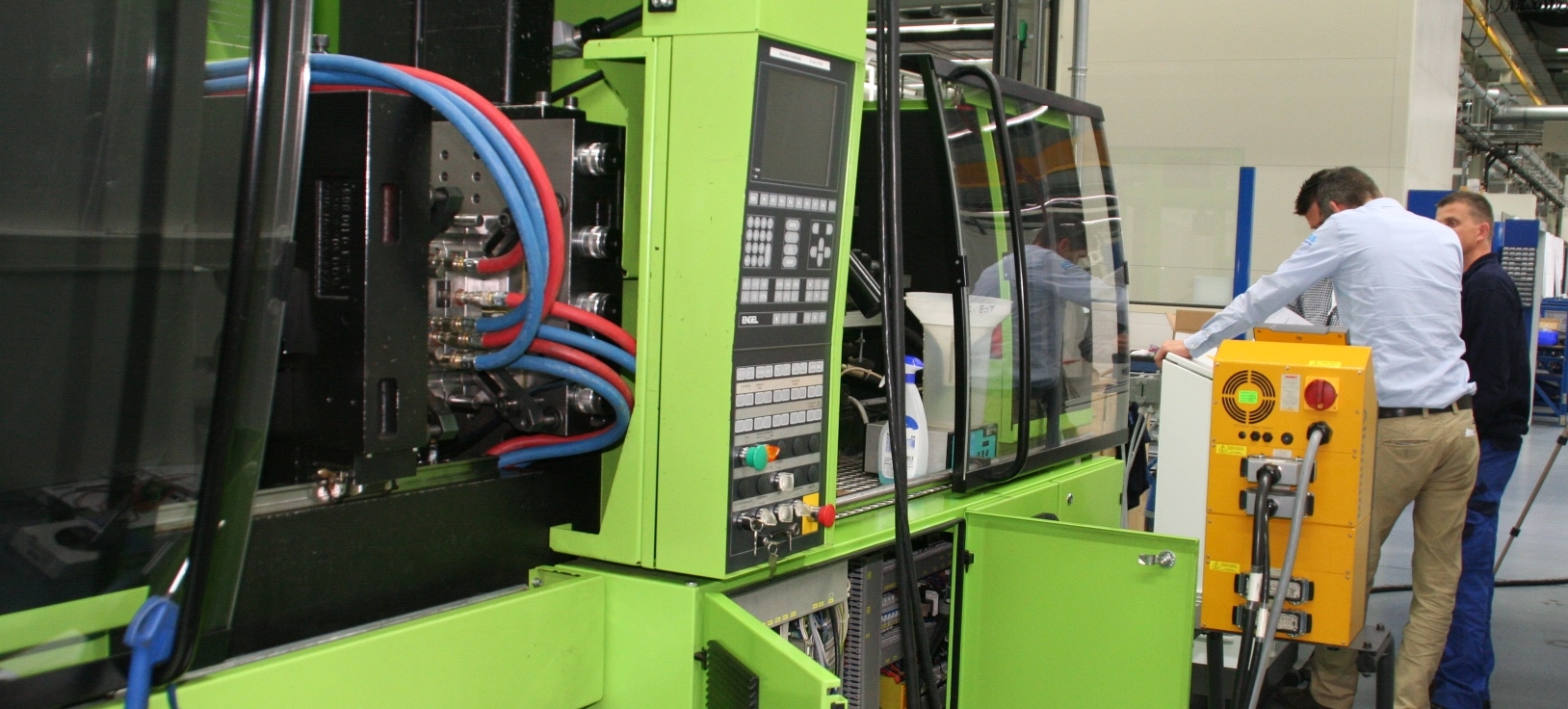Injection moulding with IAI actuators and Trio motion controller - ATB ...