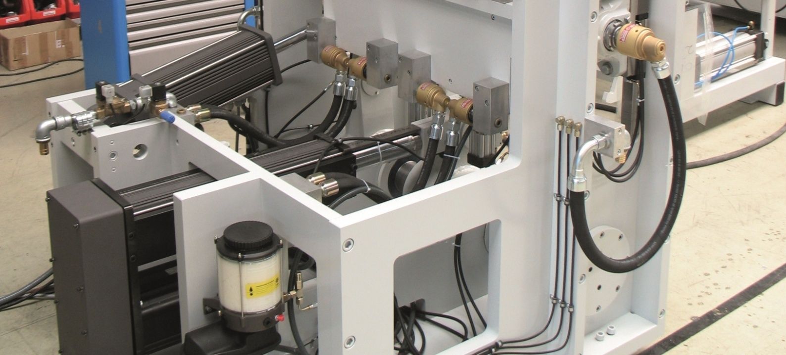 Thermoform machine with Exlar rollerscrew actuators - ATB Automation