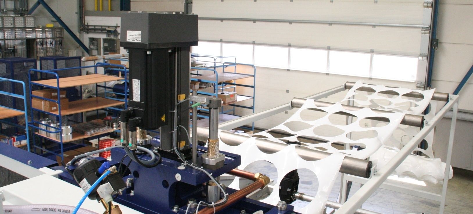 Thermoform machine with Exlar rollerscrew actuators - ATB Automation