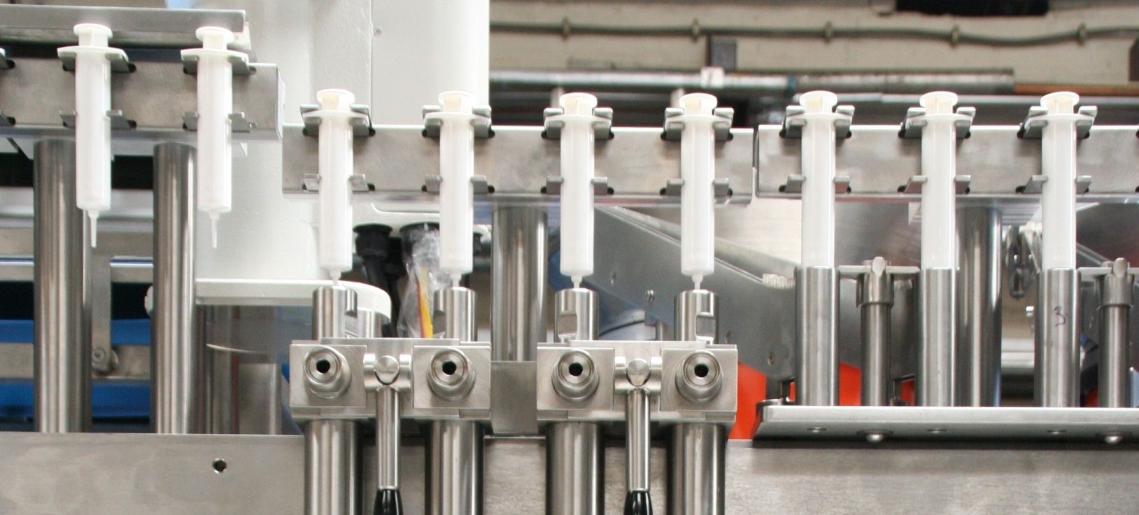 Filling machine pharmaceutical syringes with IAI scara robot - ATB ...